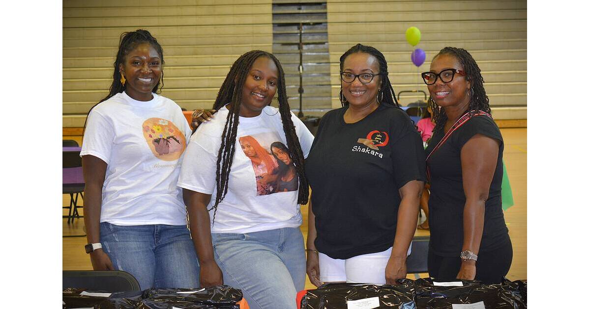 Back-to-School Event Lends a Hand, Providing Backpack and School ...