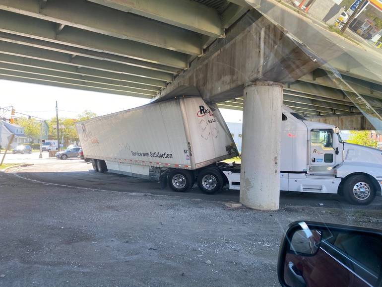 Tractor Trailer Gets Stuck Beneath Parkway Bridge | TAPinto