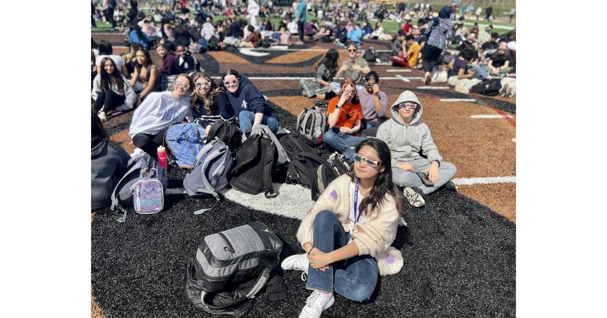 East Brunswick High School Students Take to the Field to View the ...