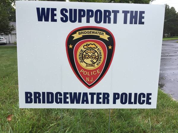 Bridgewater Man Distributing Signs in Support of Local Police | TAPinto